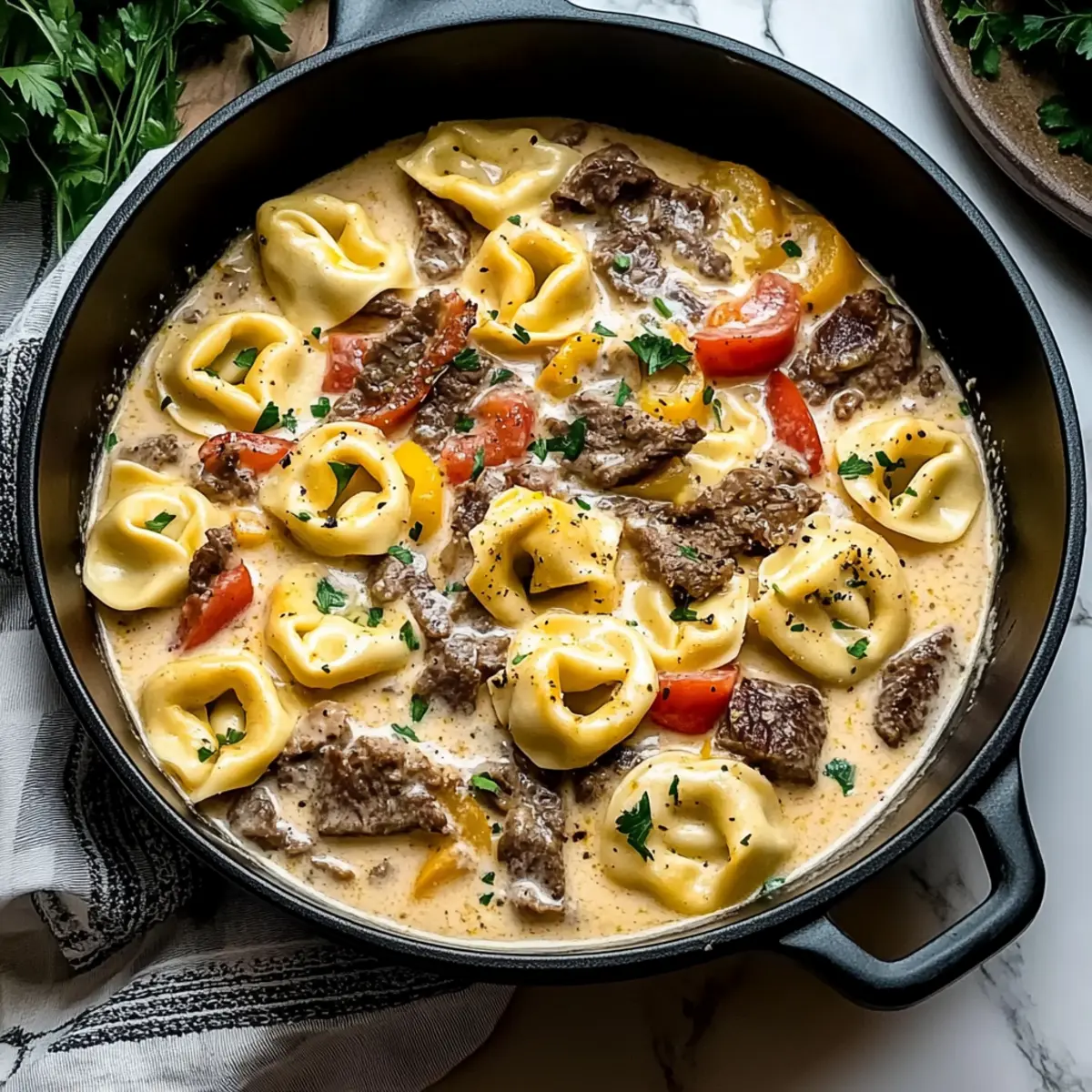 Ultimate Cheesesteak Tortellini in Creamy Provolone Sauce